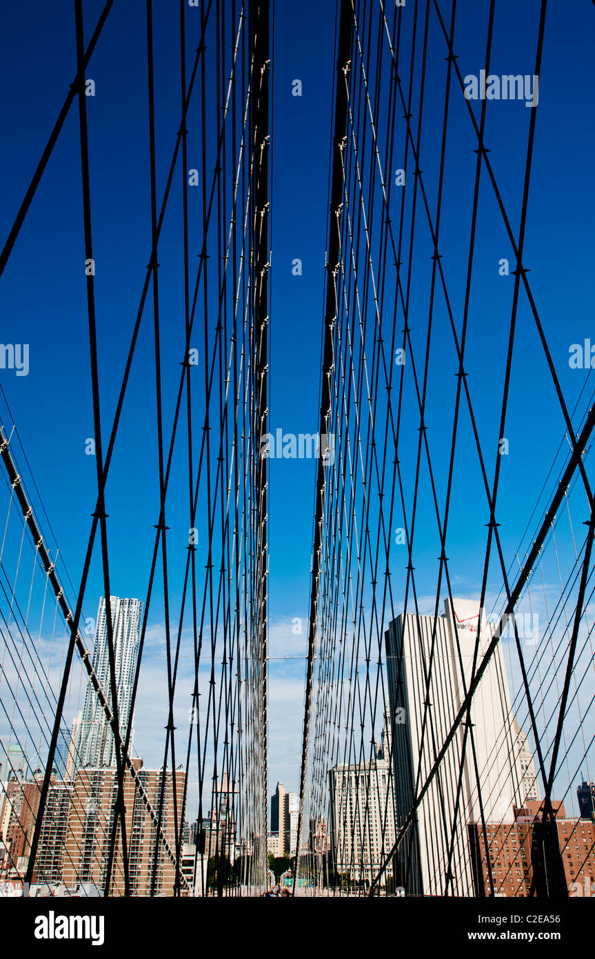 Web like cable arrangement of brooklyn bridge with lower manhattan ...