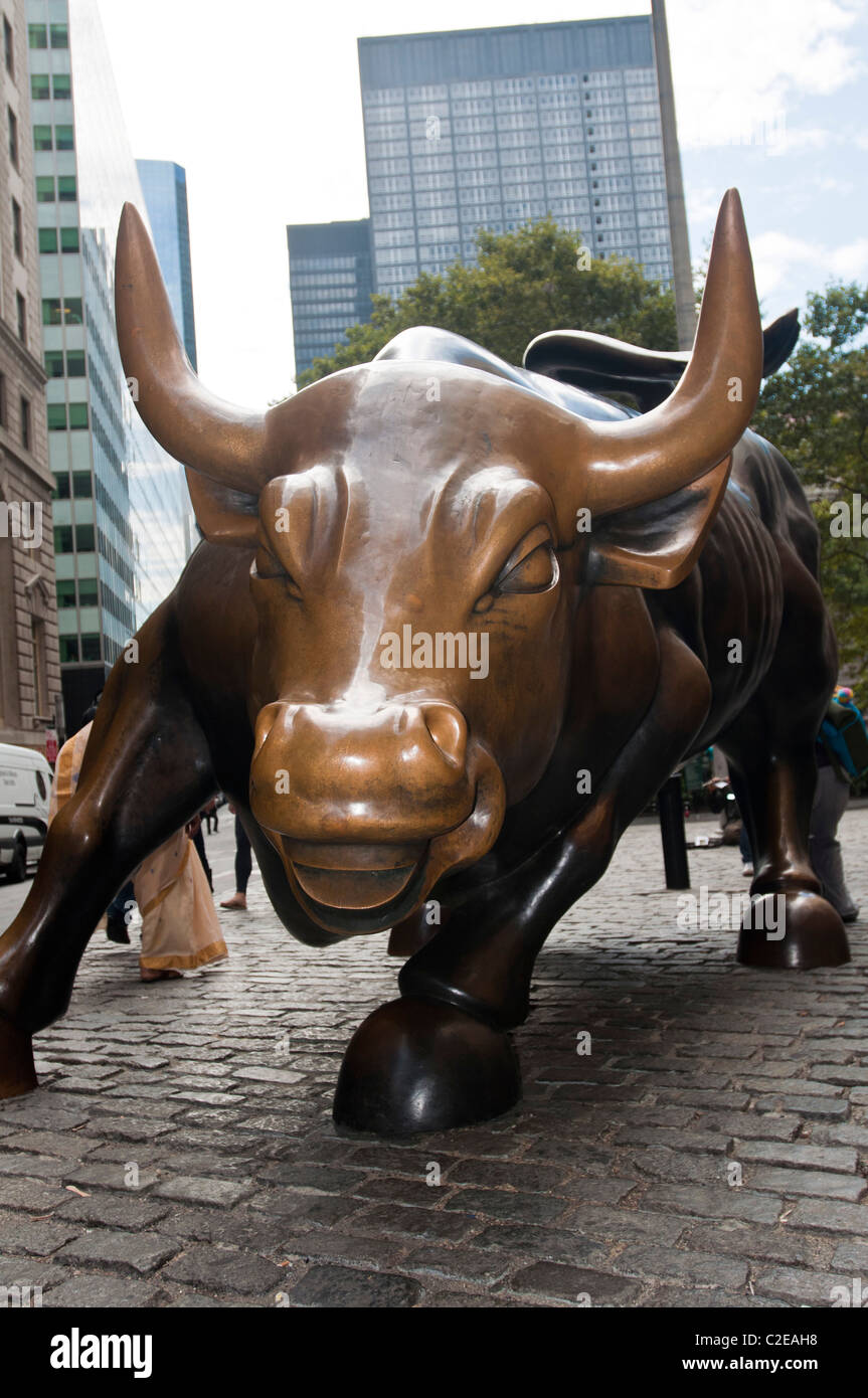 Charging Bull. Wall Street Bull or Bowling Green Bull bronze statue, Financial District, NYC ...