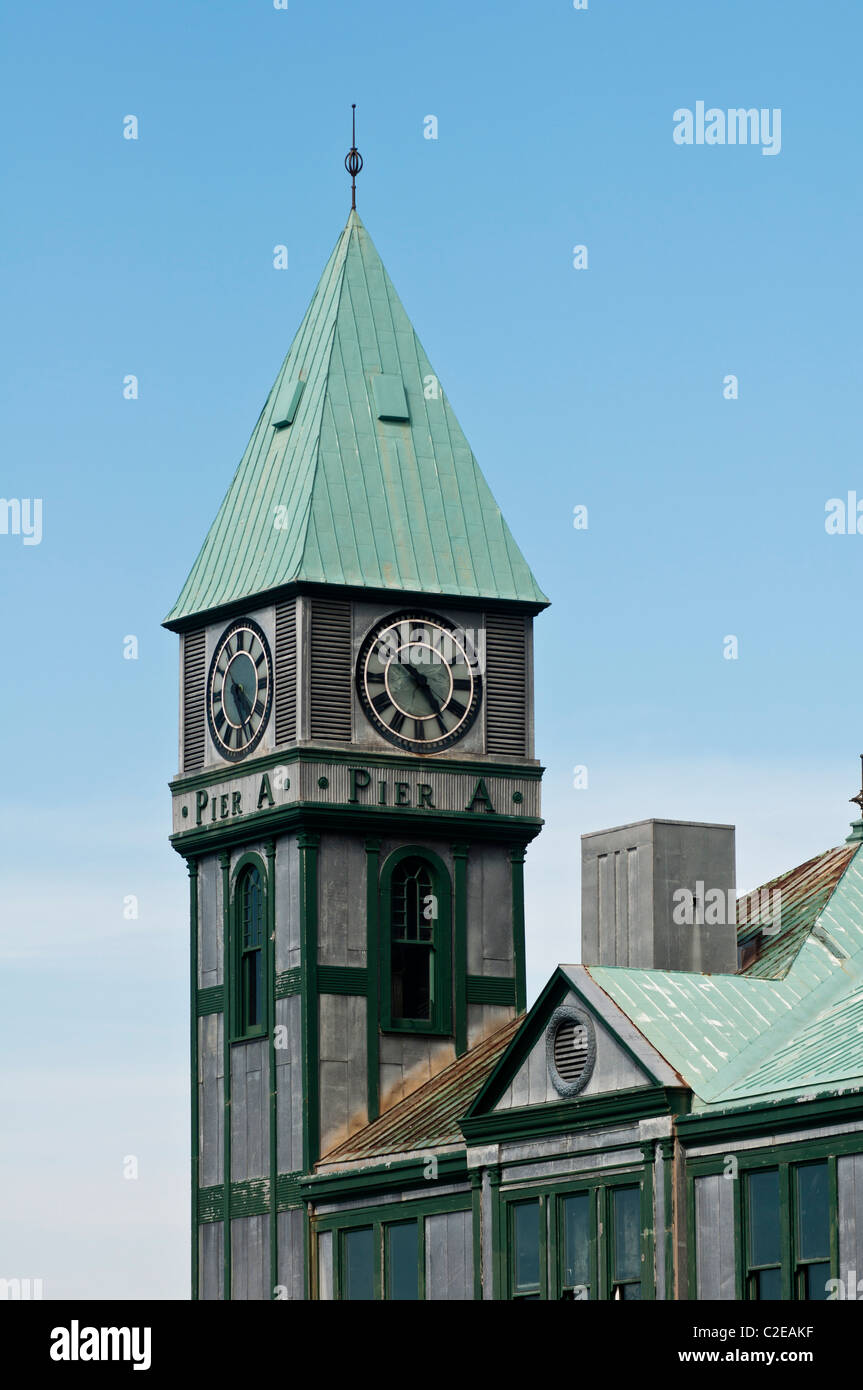 City Pier A with clock tower, blue sky background, Battery Park ...