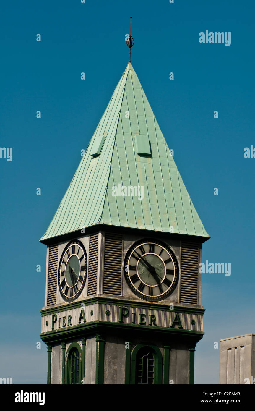 City Pier A with clock tower, blue sky background, Battery Park ...