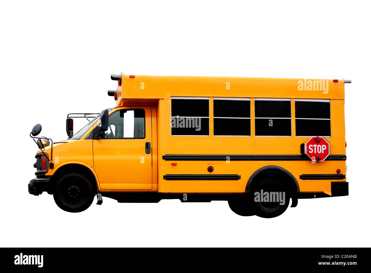 A yellow isolated school bus on white Stock Photo - Alamy