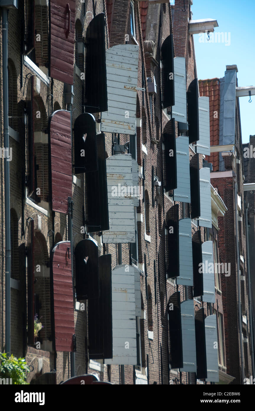 Traditional shuttered buildings in Amsterdam Stock Photo - Alamy