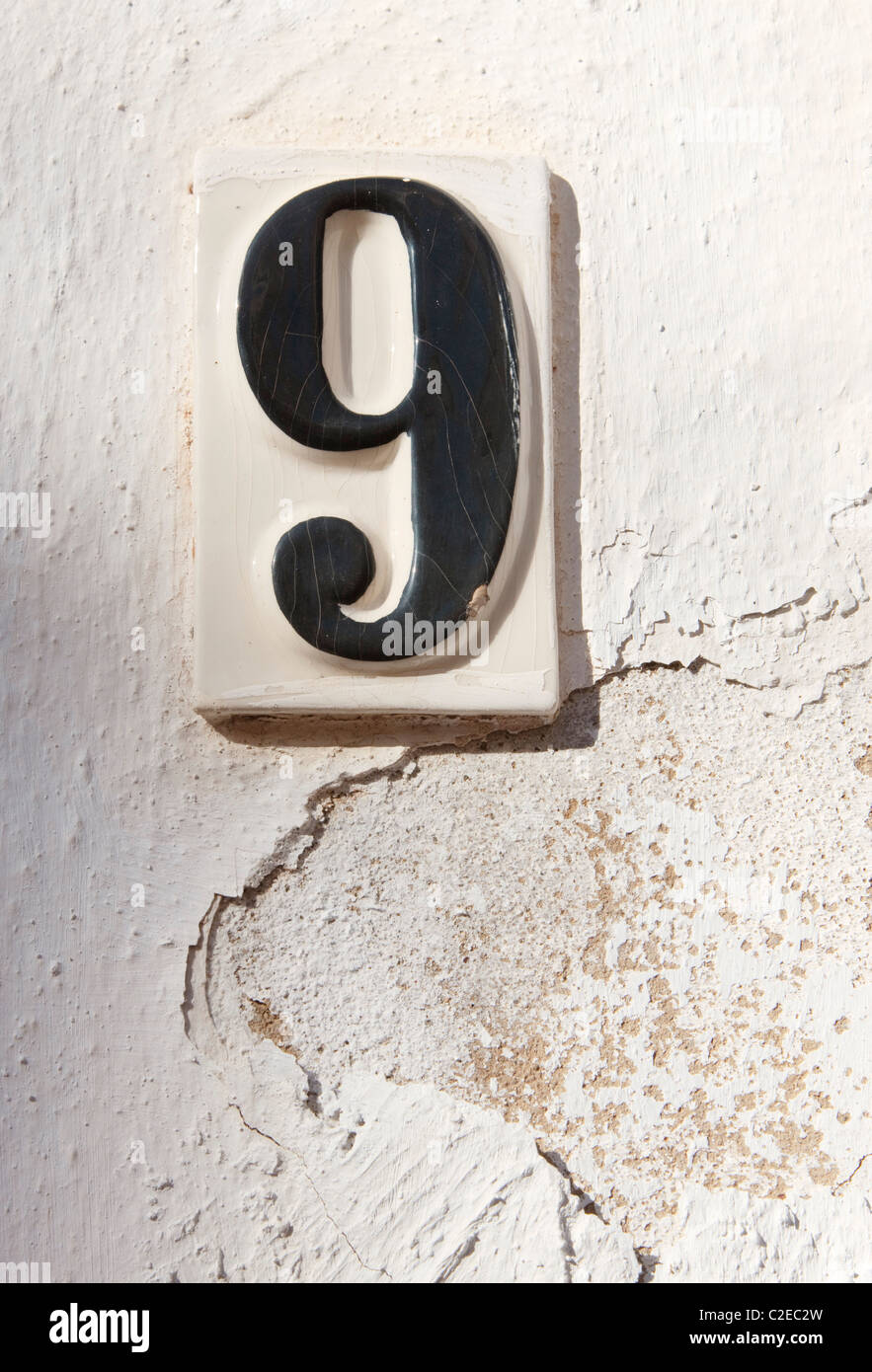 Ceramic Number Nine On Whitewashed Wall Stock Photo - Alamy