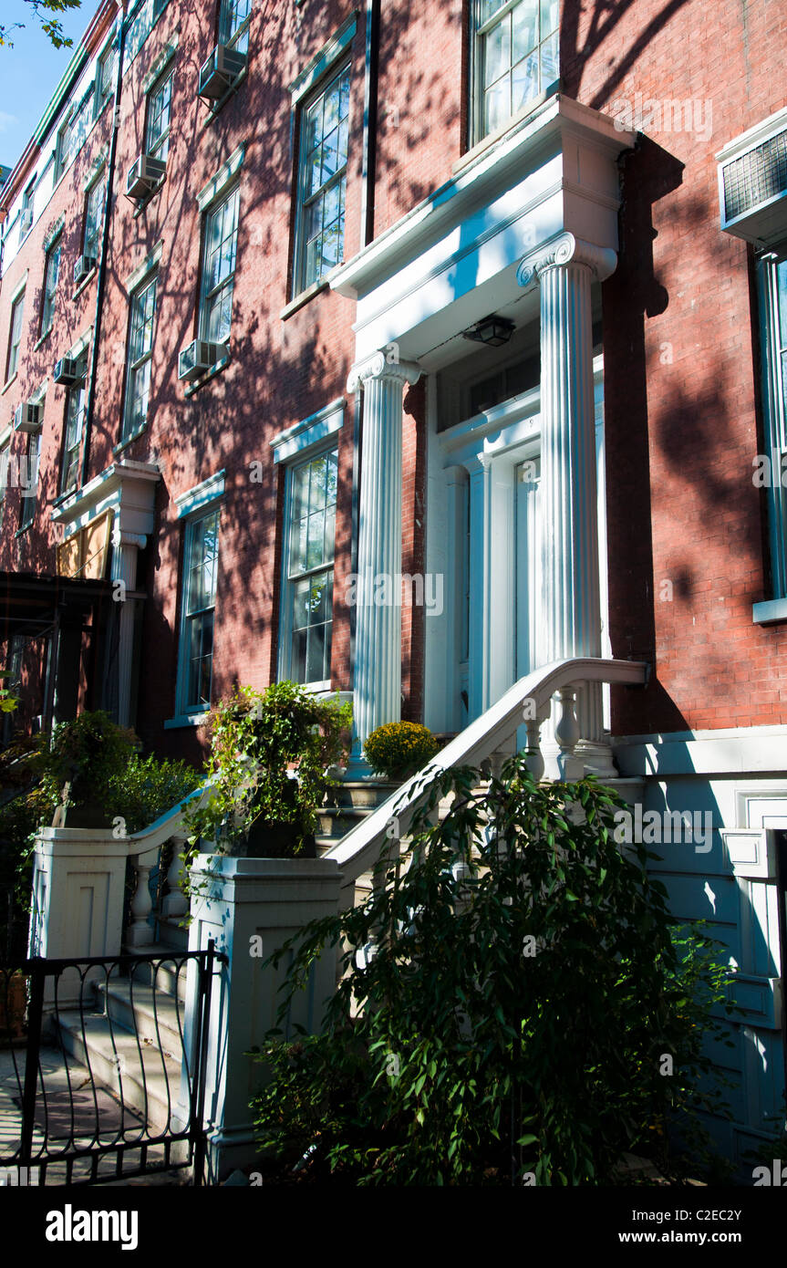 The Row of Greek Revival townhouses with stone stairs at Washington ...