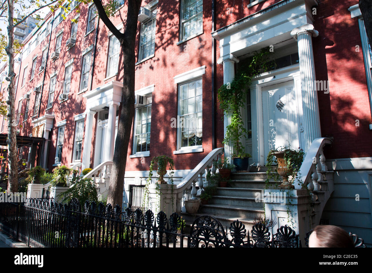The Row of Greek Revival townhouses with stone stairs at Washington ...