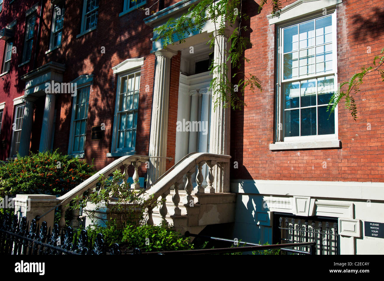 The Row of Greek Revival townhouses with stone stairs at Washington ...
