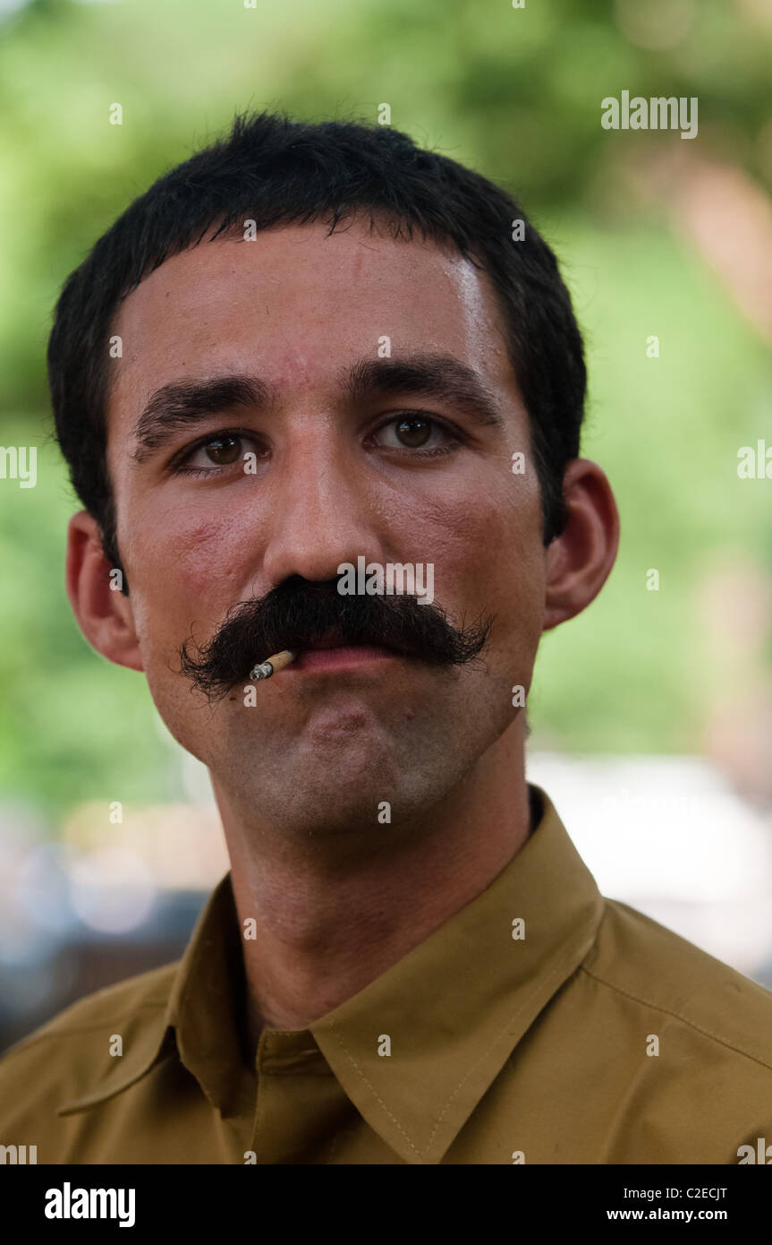 Rickshaw runner about to drive his tuk tuk though India Stock Photo - Alamy