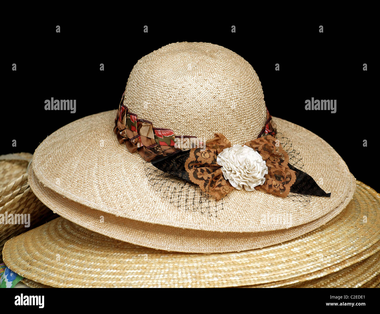 Straw hats with ribbons hi-res stock photography and images - Alamy