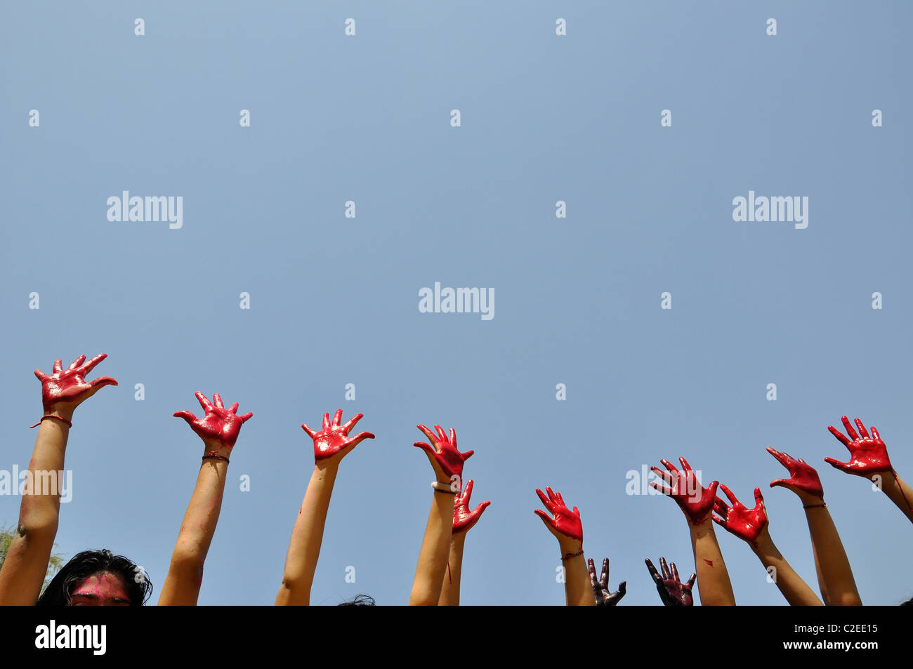 raised colour hands of indian girls Stock Photo - Alamy