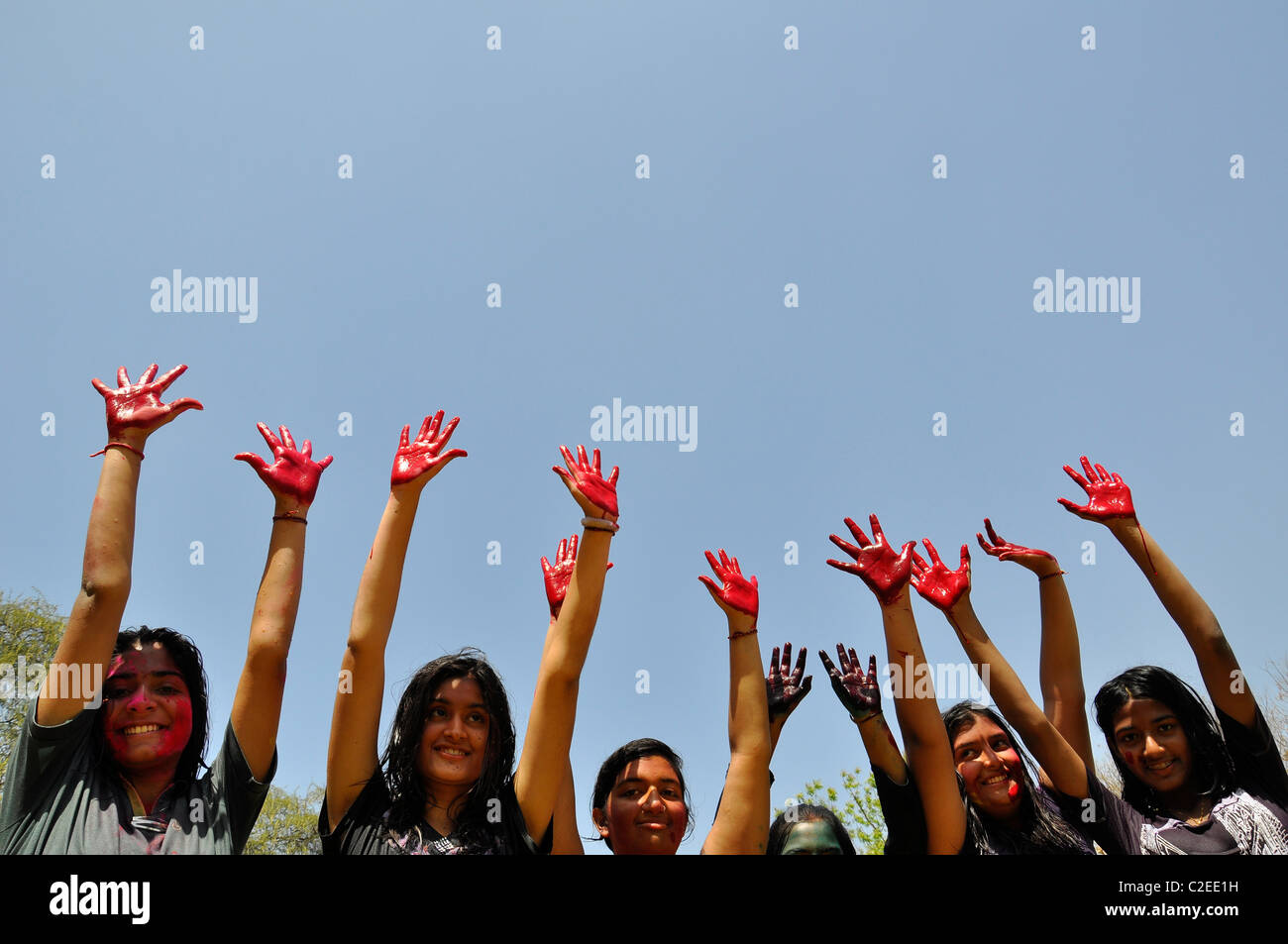 Indian girls playing holi Stock Photo - Alamy