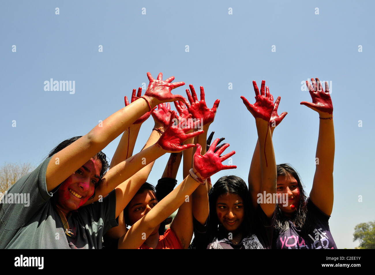 Indian girls playing holi Stock Photo - Alamy