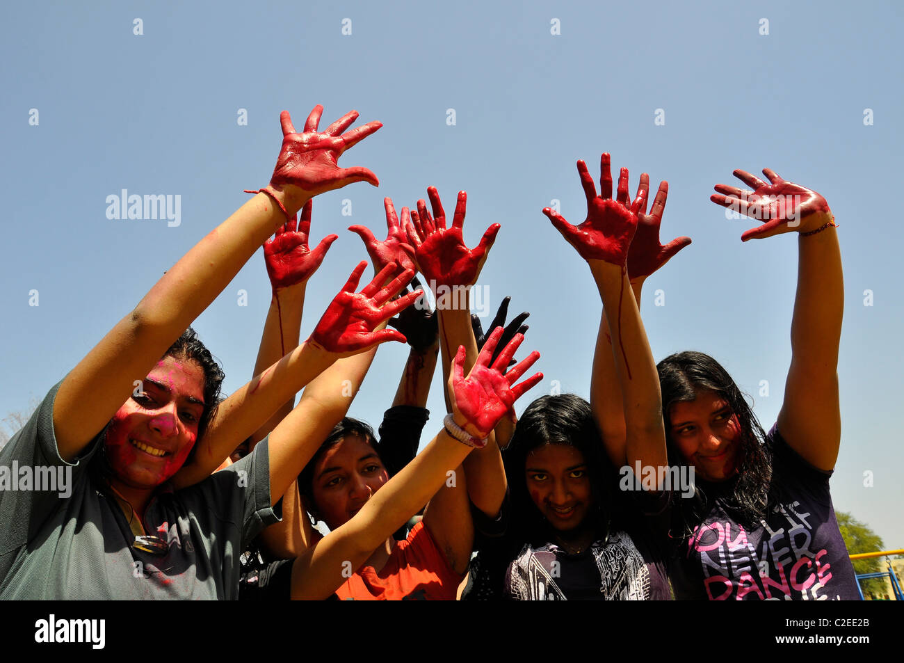 People playing festival colours hi-res stock photography and images - Alamy