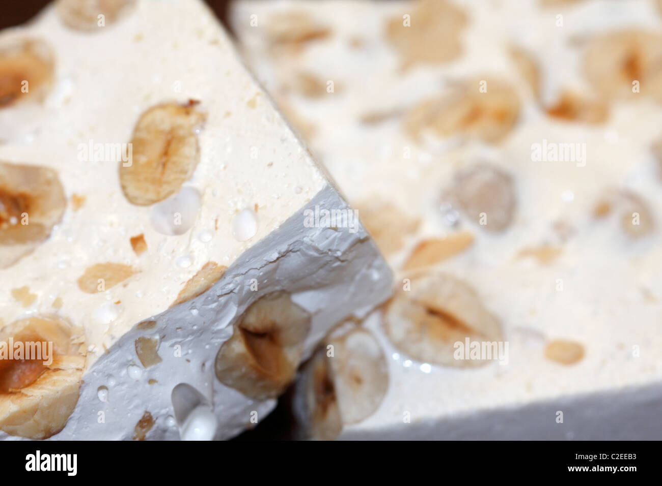Traditional Italian torrone nougat with hazelnuts Stock Photo - Alamy