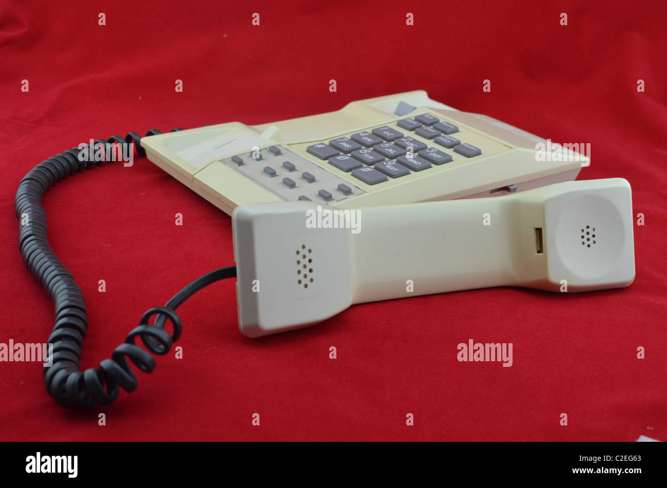 Telephone - red background Stock Photo - Alamy