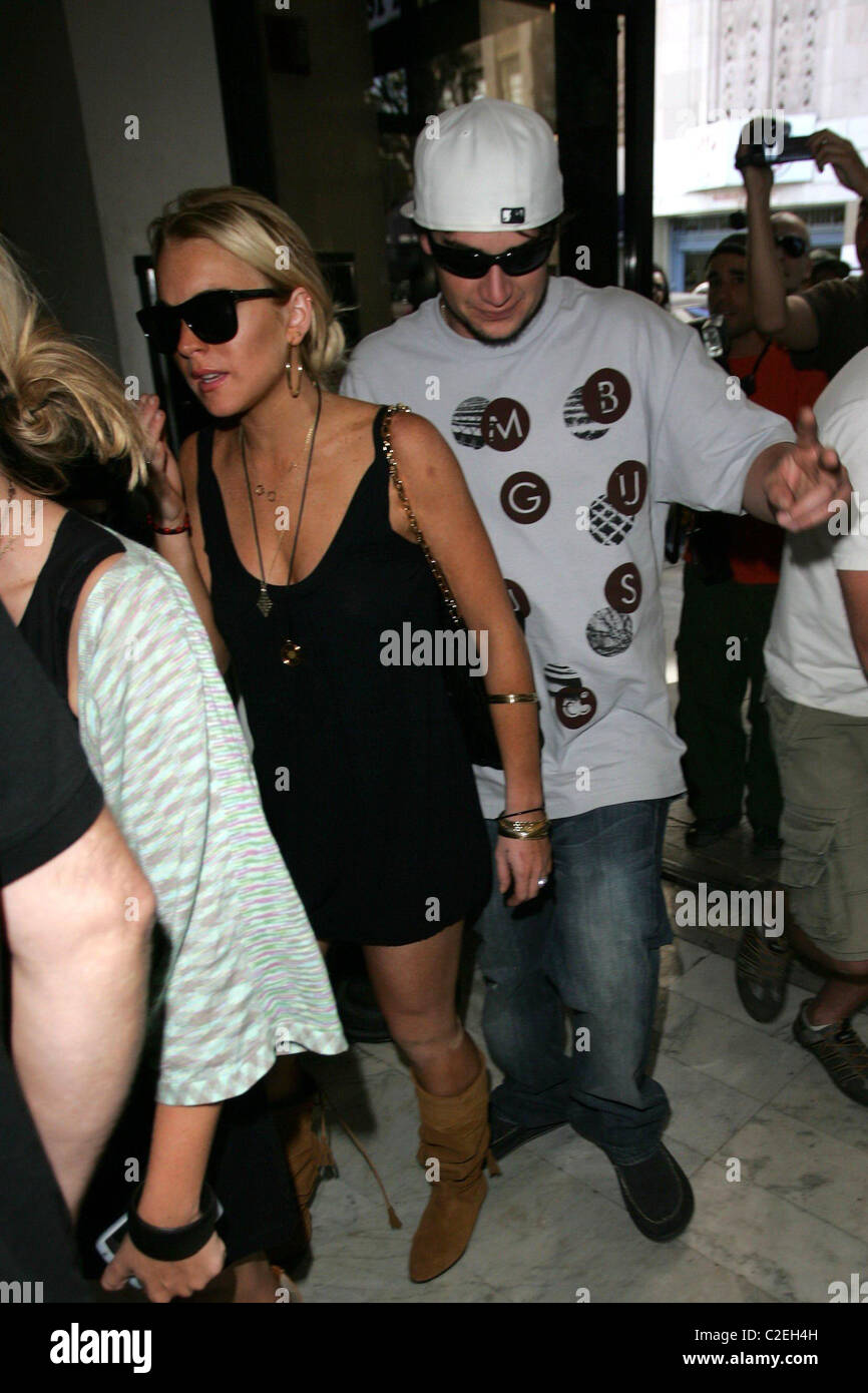 Lindsay Lohan and boyfriend Riley Giles walking hand in hand as they ...