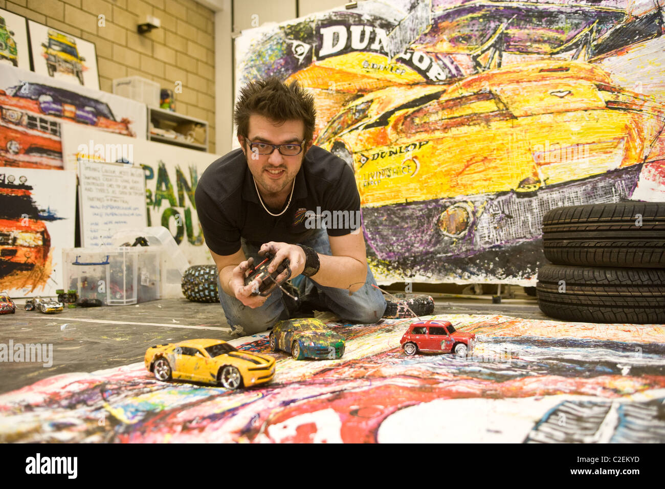 11.4.2011 Ian Cook who paints cars using remote controlled toy cars and ...
