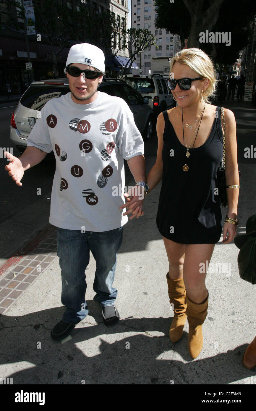 Lindsay Lohan and boyfriend Riley Giles walking hand in hand as they ...