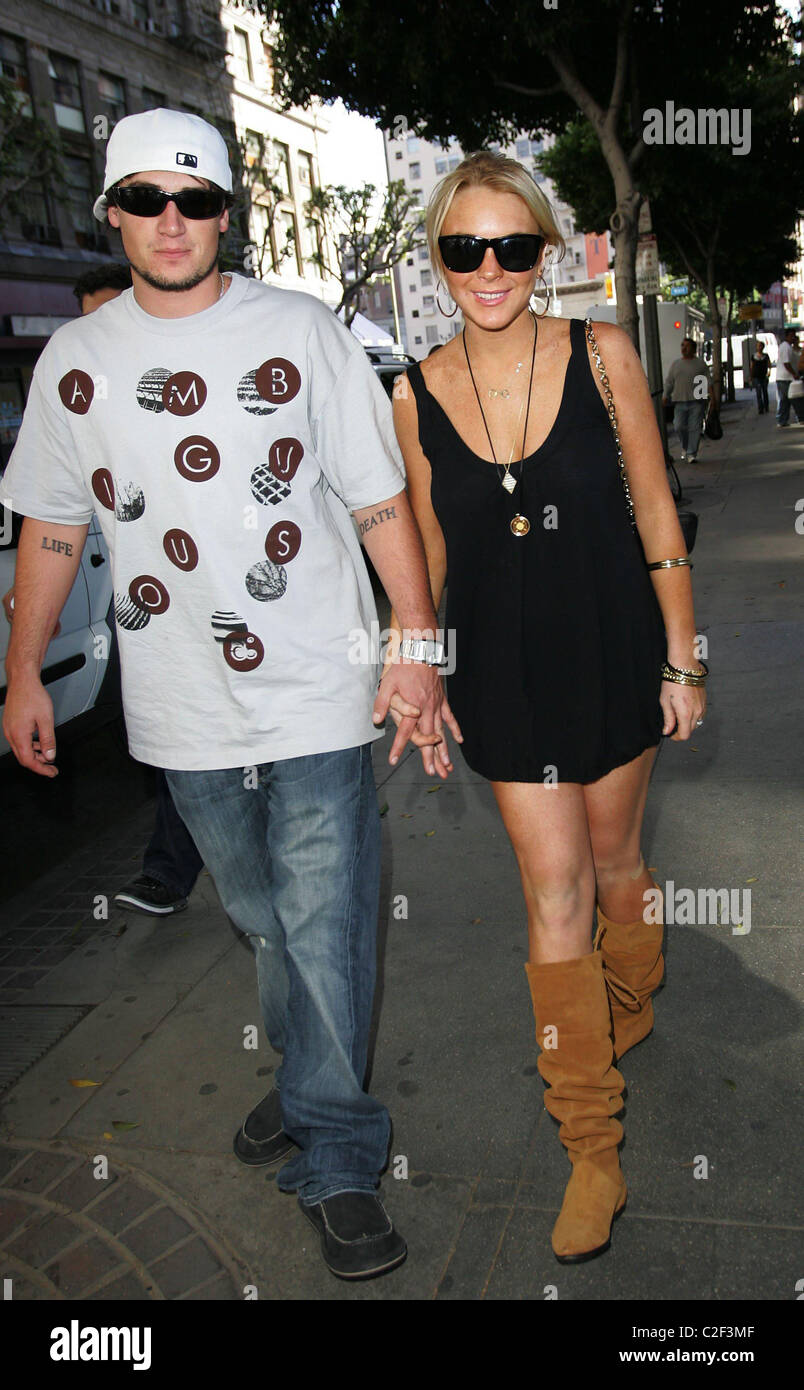 Lindsay Lohan and boyfriend Riley Giles stroll down the streets of ...