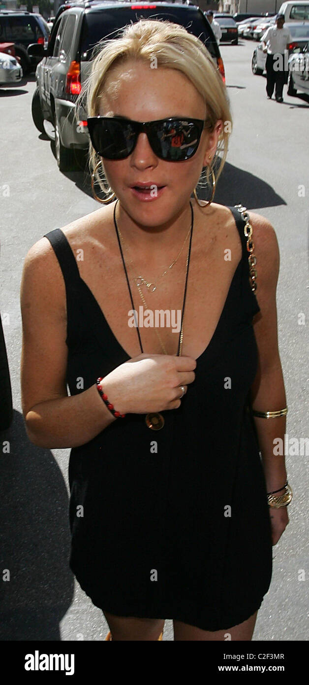 Lindsay Lohan Lindsay Lohan and boyfriend Riley Giles stroll down the ...