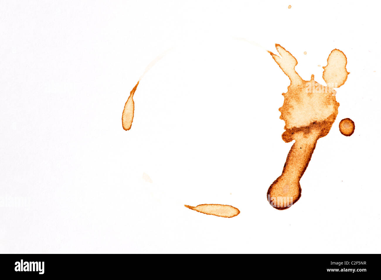 A coffee stain on a desk or paper isolated on white Stock Photo - Alamy