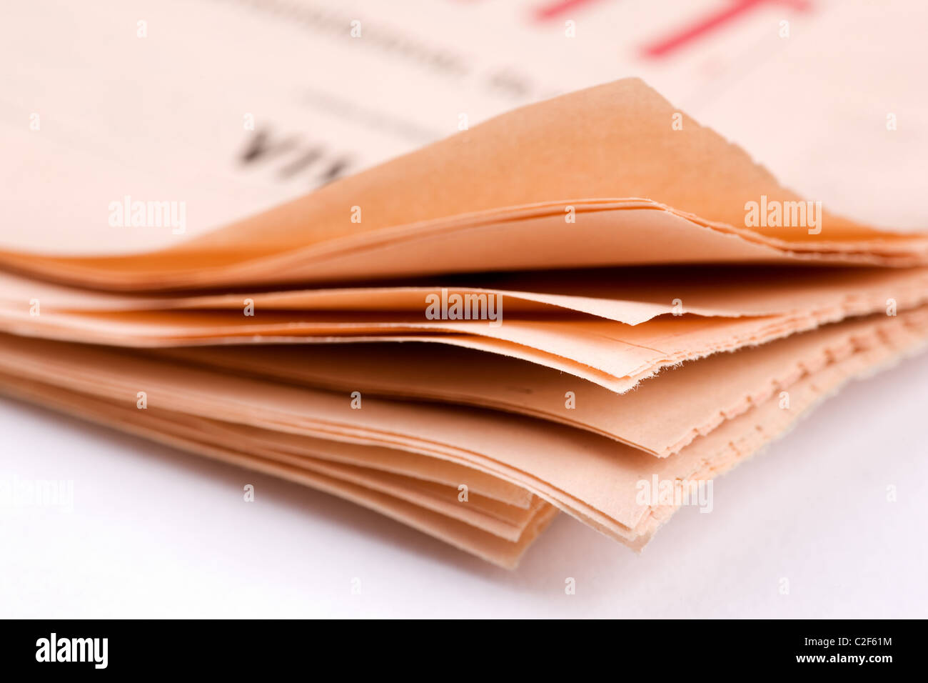 Detail of the corner of a newspaper over white Stock Photo - Alamy