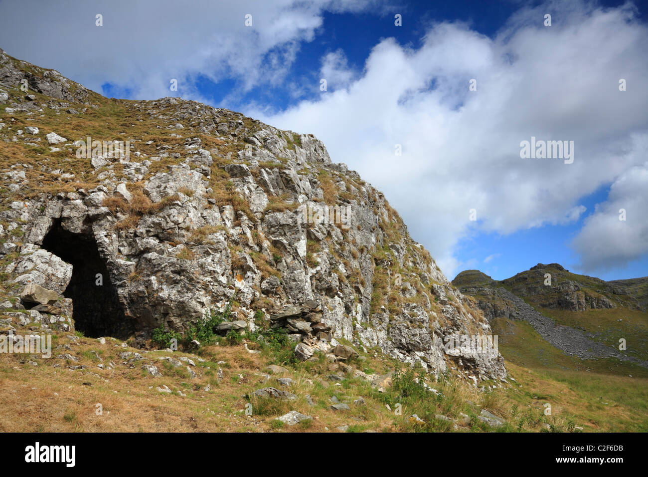 A cave on the side of the Attermire Scar in Yorkshire Stock Photo - Alamy