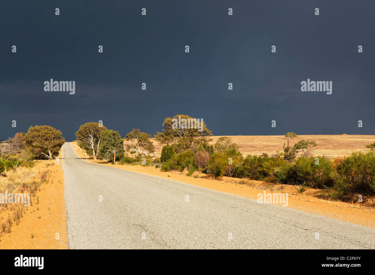 Road with approaching Storm over Outback Landscape, Eneabba Western ...