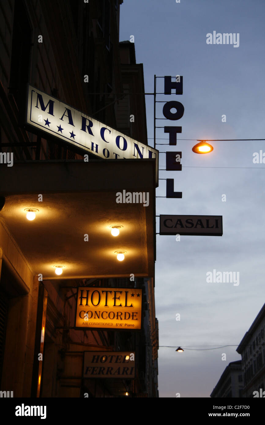 Hotel signs at night in the termini district hi-res stock photography ...