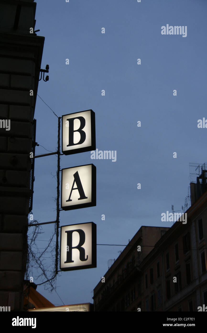 bar sign notice at night in street in rome italy Stock Photo - Alamy