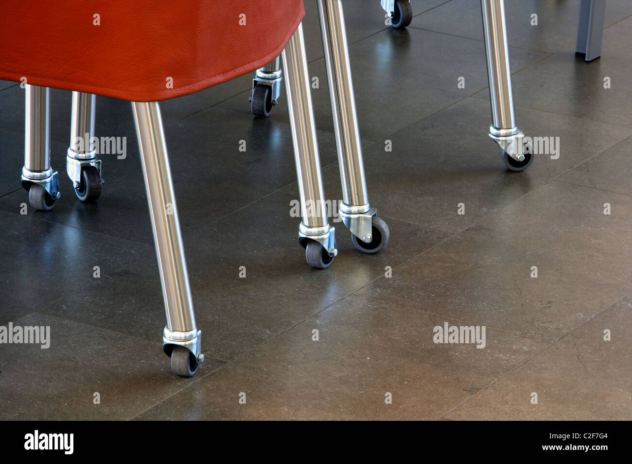 Chairs with small wheels. Girona. Spain Stock Photo - Alamy
