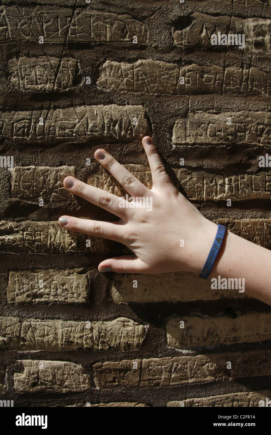 names graffiti carved on brick wall in colosseum coliseum , rome ...