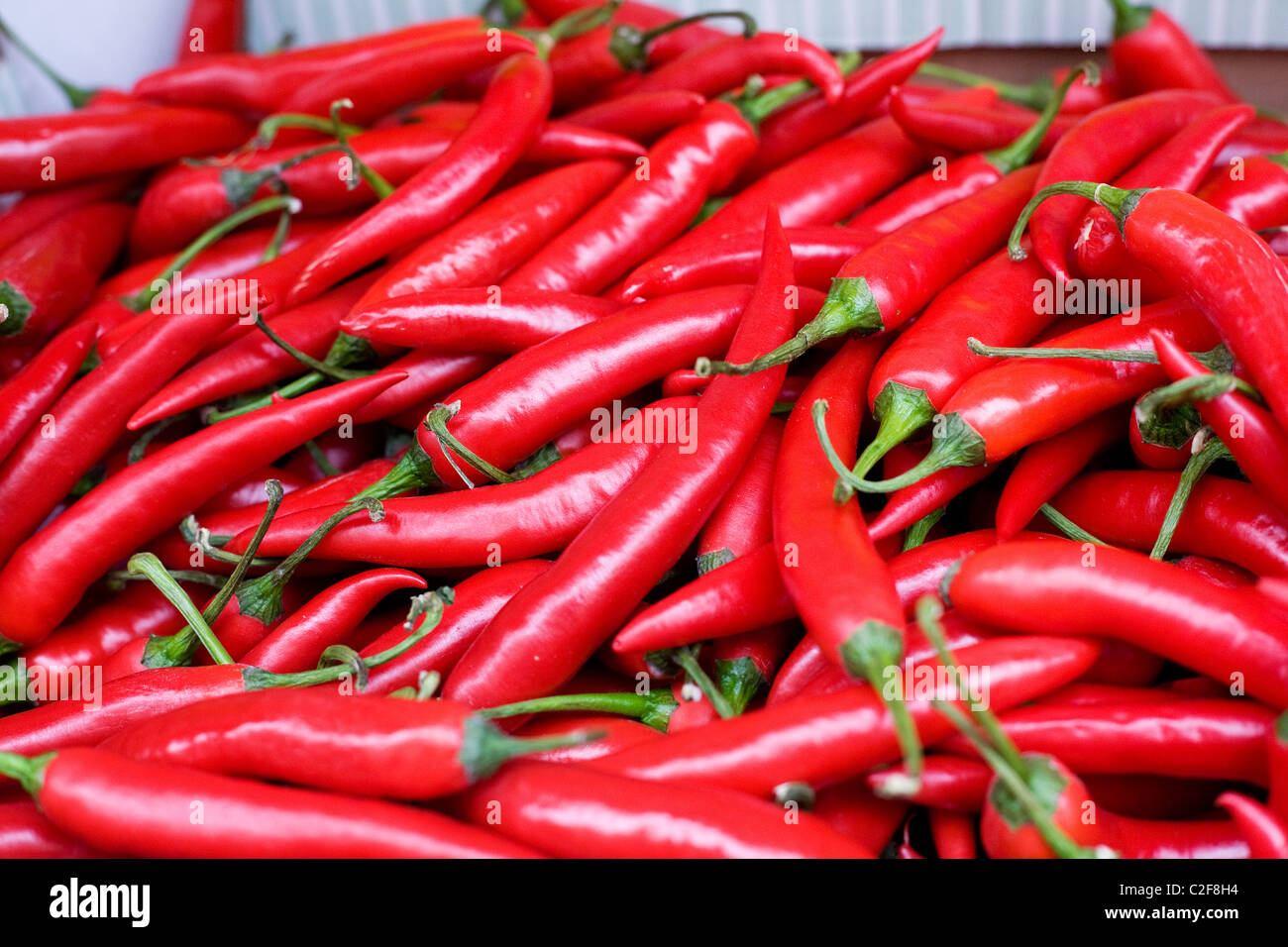A bulk display of hot red peppers Stock Photo - Alamy
