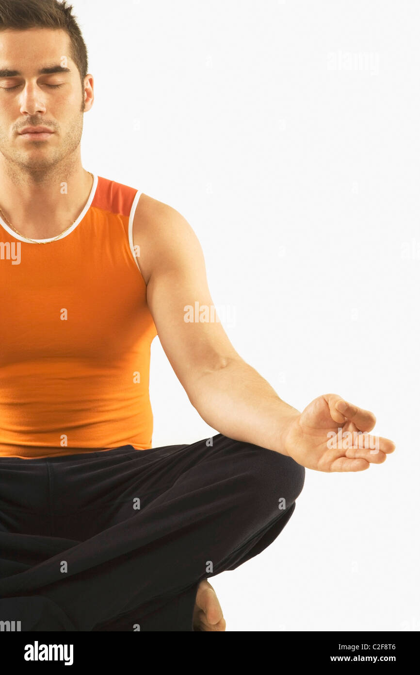 Man In A Yoga Pose Stock Photo - Alamy