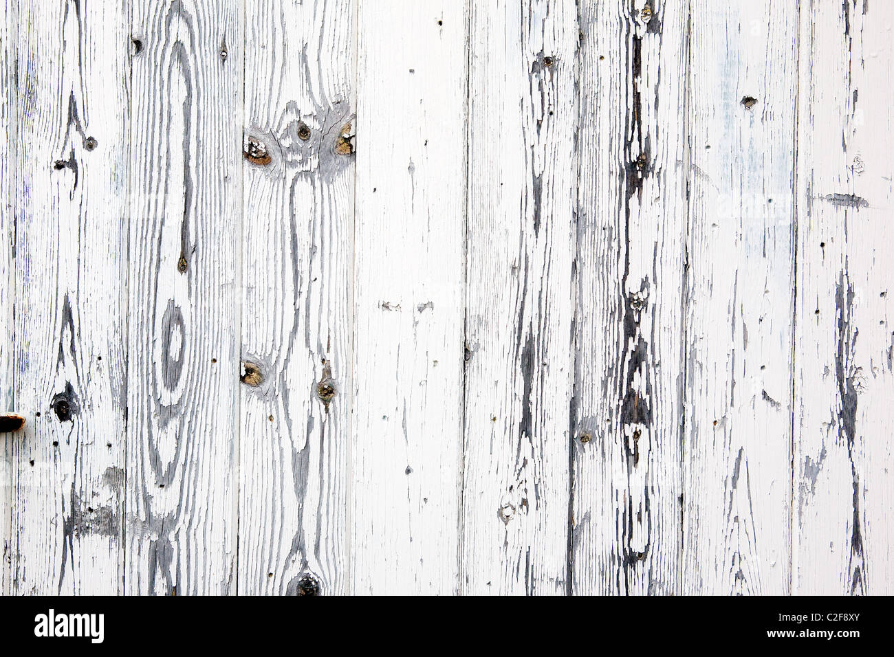 Painted white wood weathered through the years Stock Photo - Alamy