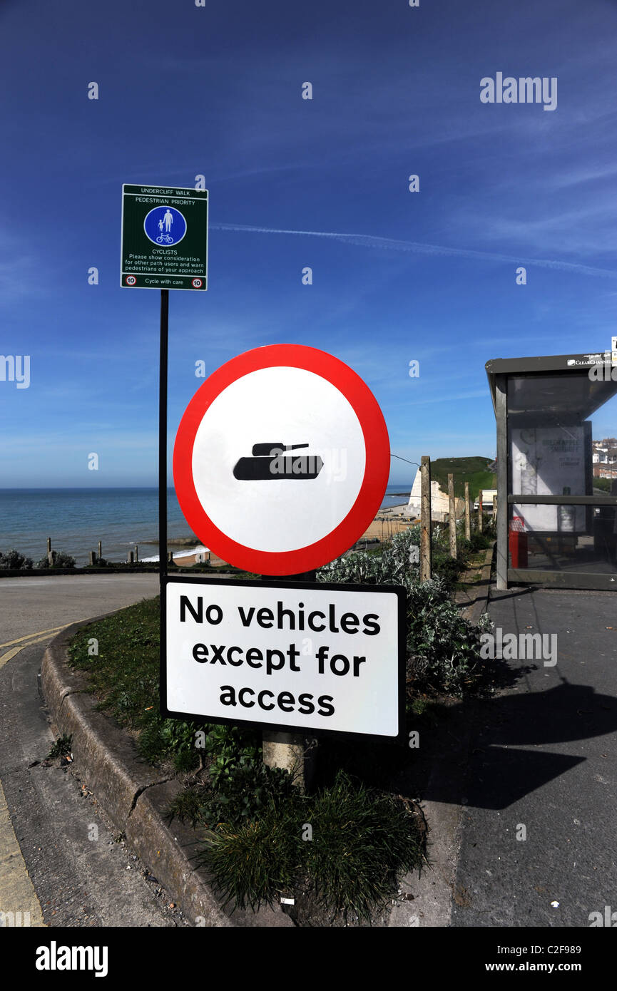 A defaced no vehicles except for access sign, with the car being ...