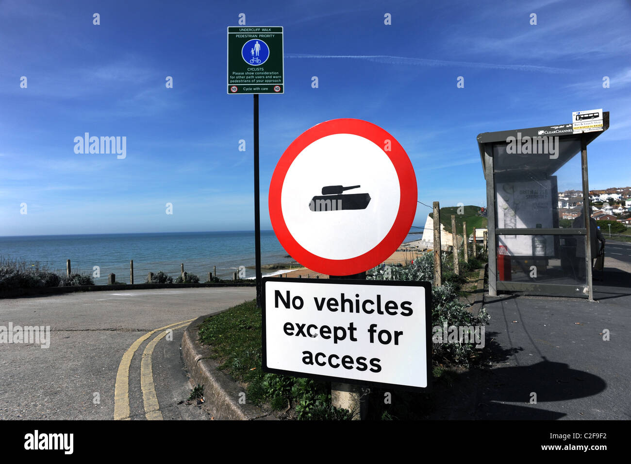 A defaced no vehicles except for access sign, with the car being ...