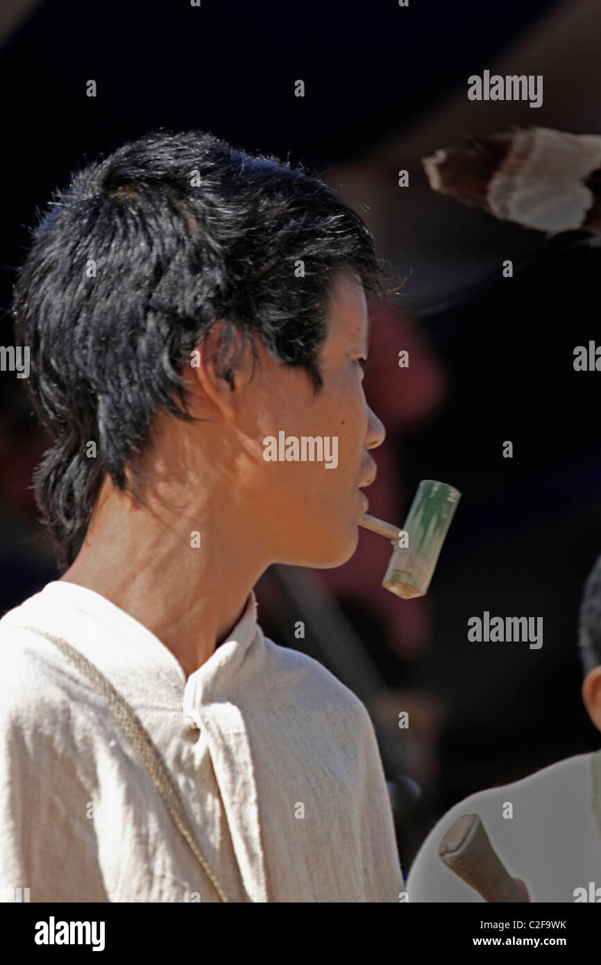 Nyishi tribes, man with smoking pipe at Namdapha Eco Cultural Festival ...