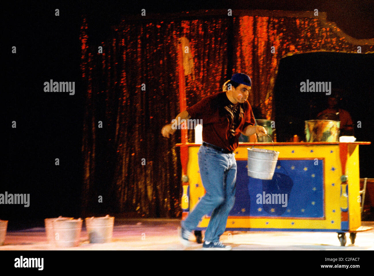 Cottle And Austen Electric Circus Clown Performing With Bucket Of Water ...
