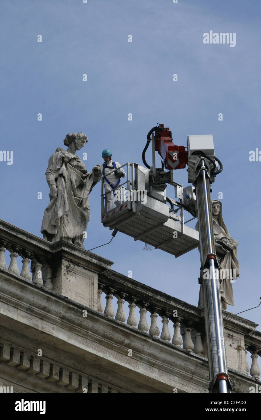 Statue lift hydraulic man scene hi-res stock photography and images - Alamy