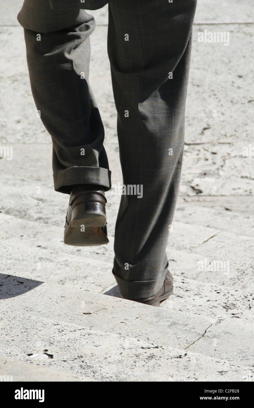 person walking in street road in city town Stock Photo - Alamy