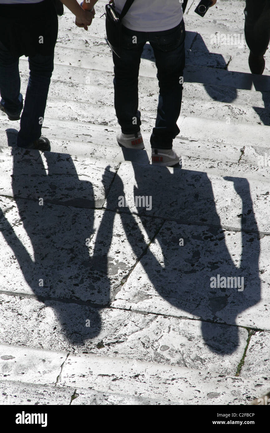 person walking in street road in city town Stock Photo - Alamy
