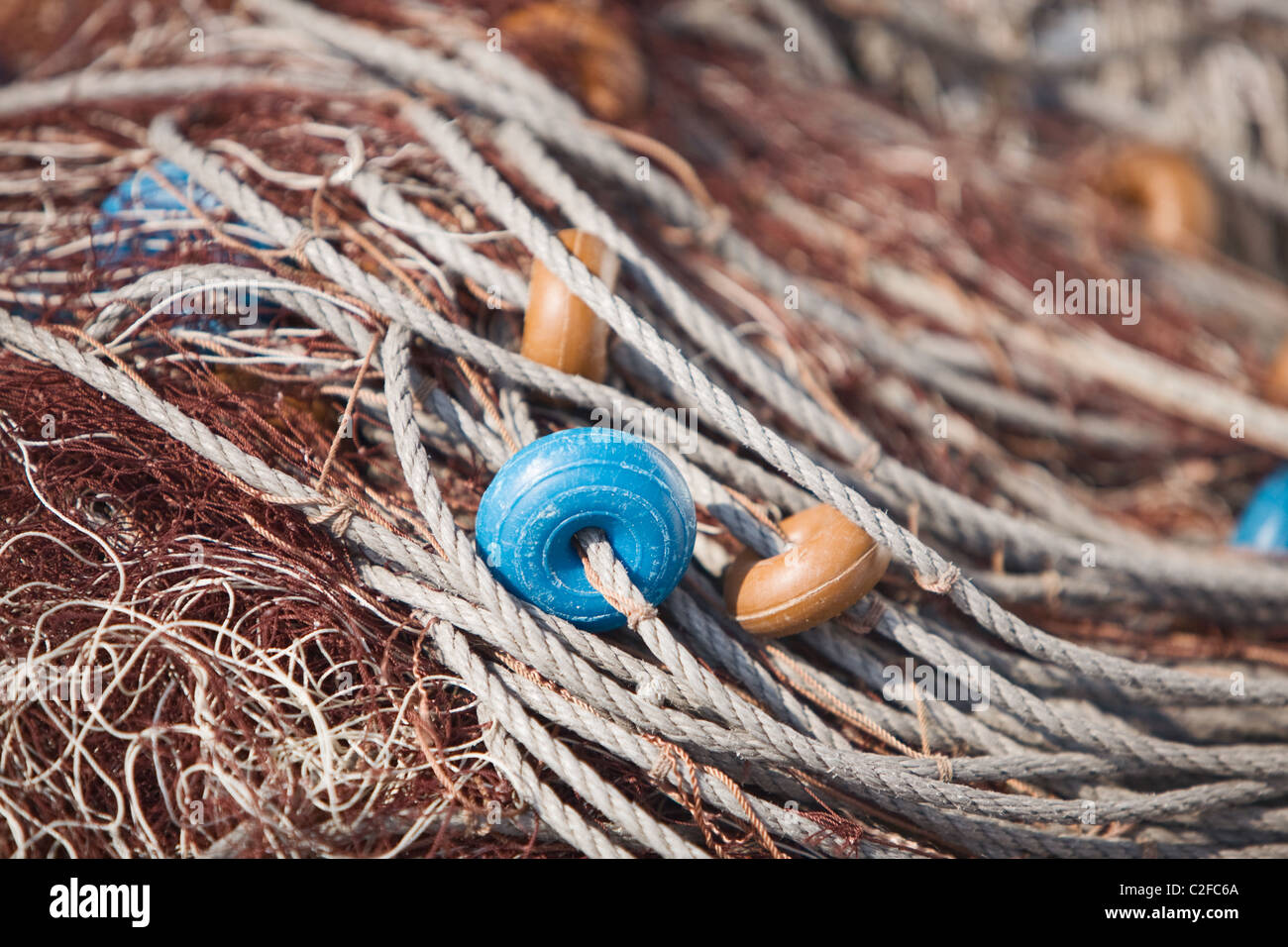 Close-up commercial fishing netting and ropes Stock Photo - Alamy