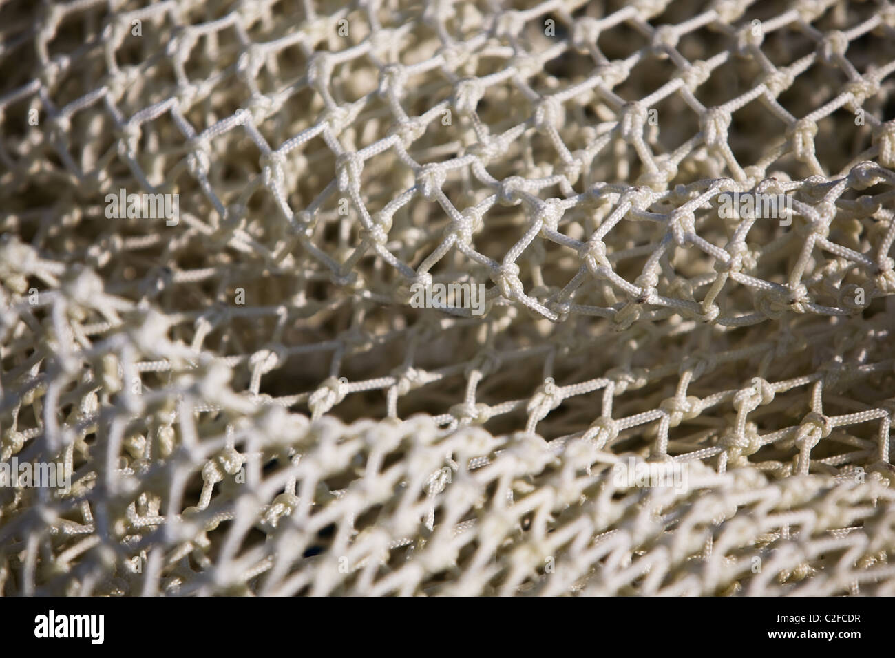 Close up commercial fishing netting Stock Photo - Alamy