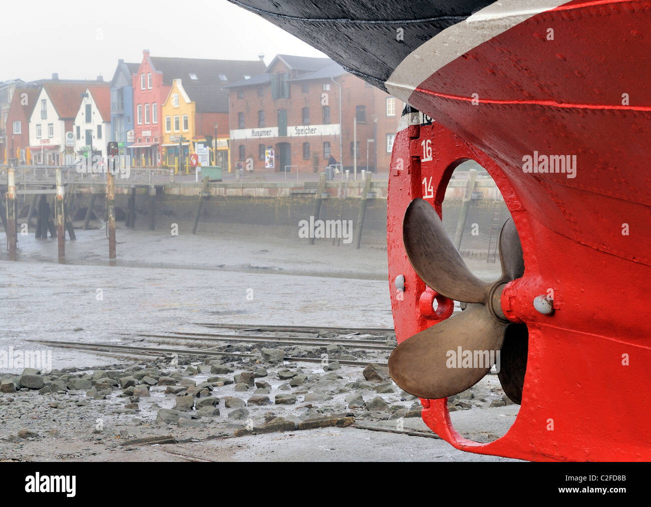 Hull and propeller of fishing boat in historic harbour, Husum ...