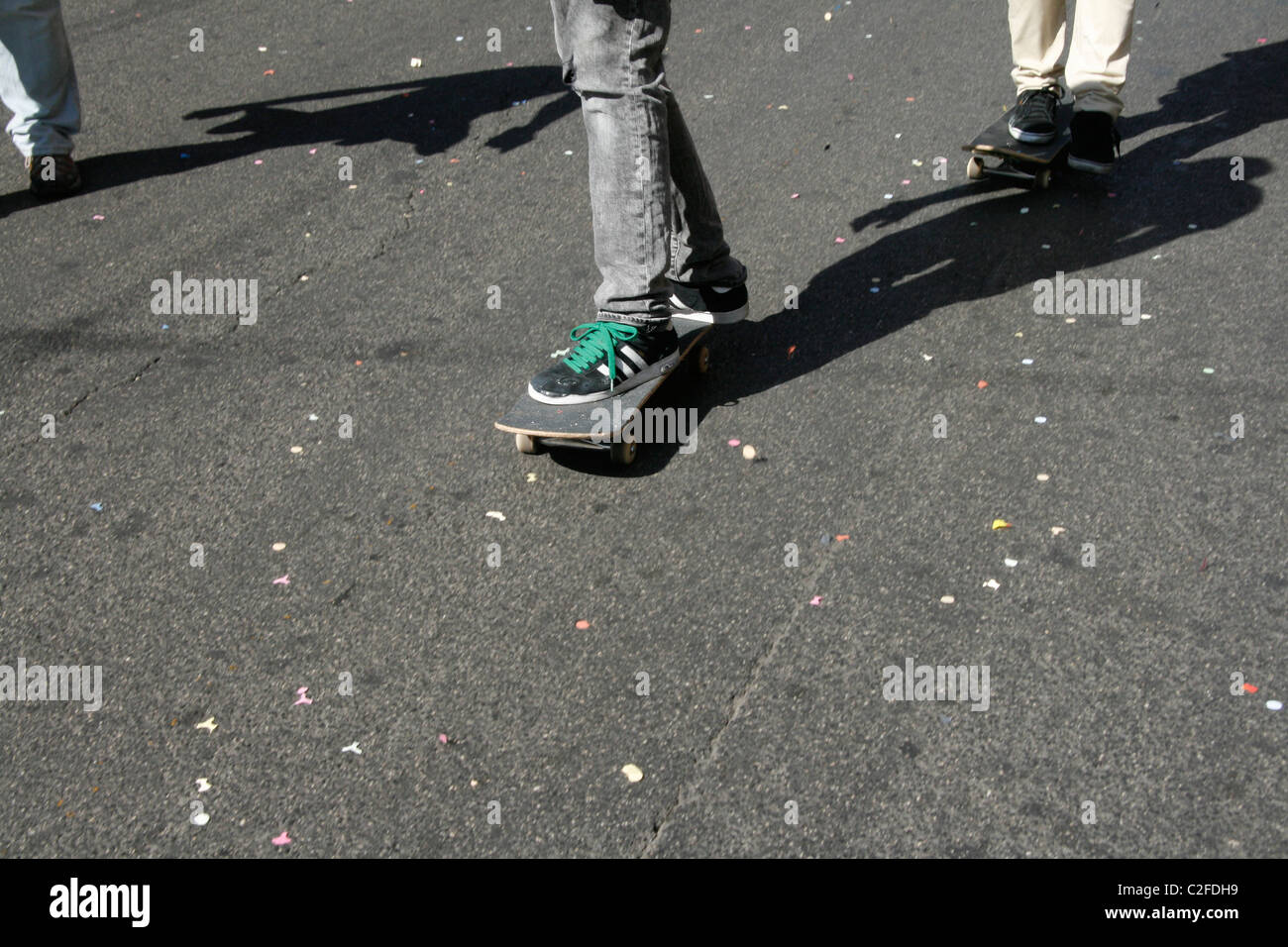 skateboarder in action on street road in city town Stock Photo - Alamy