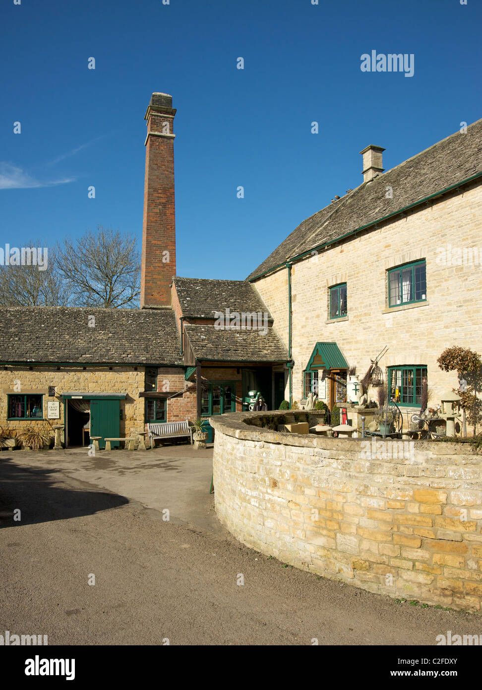 The 19th century water mill in Lower Slaughter, the Cotswolds ...