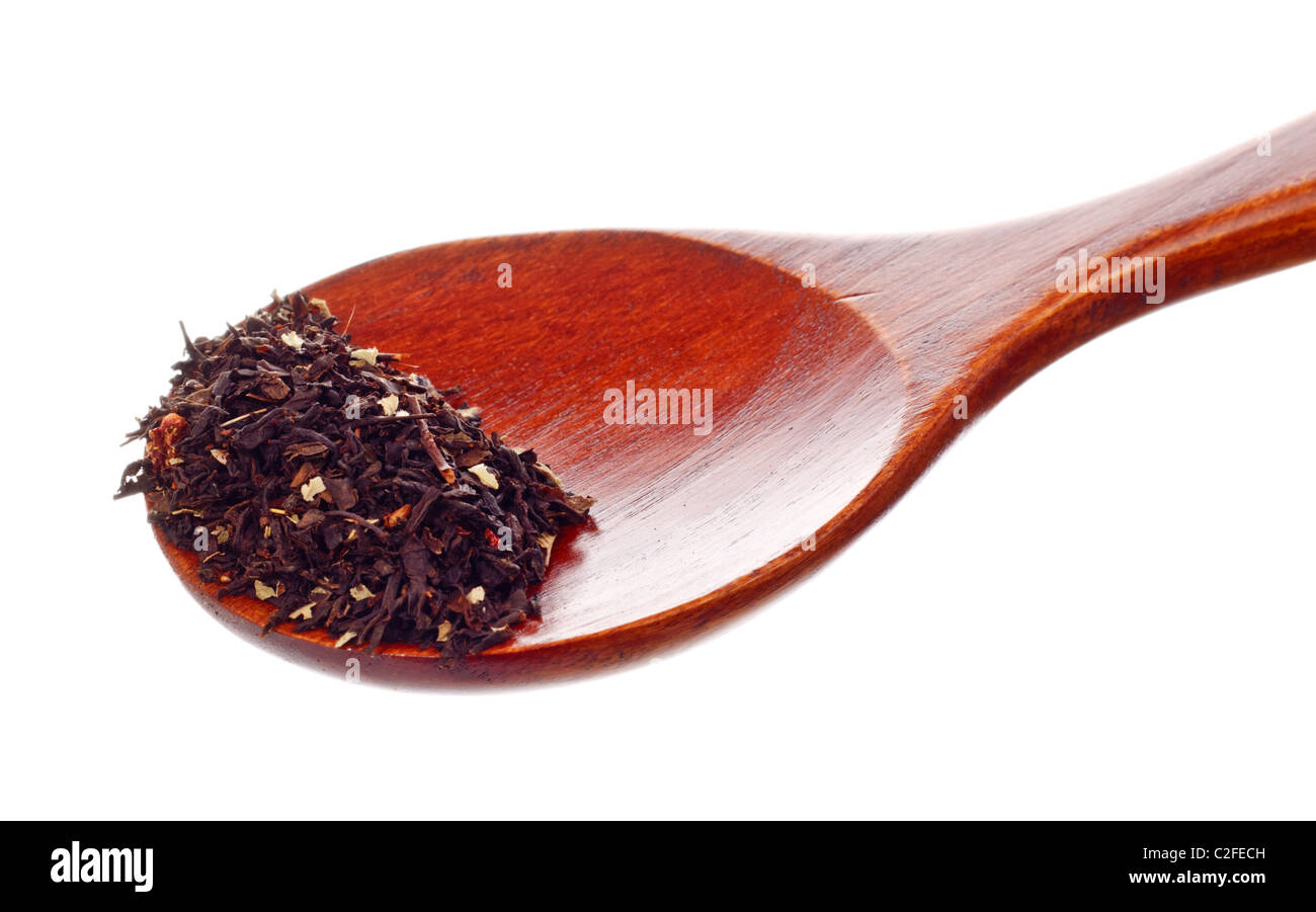 wooden spoon with tea isolated on white background Stock Photo - Alamy