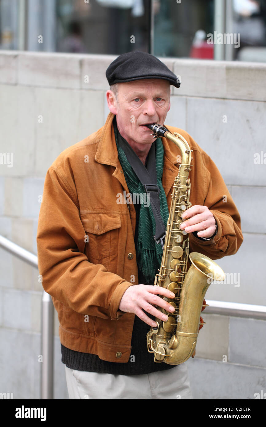 Portrait man playing saxophone hi-res stock photography and images - Alamy