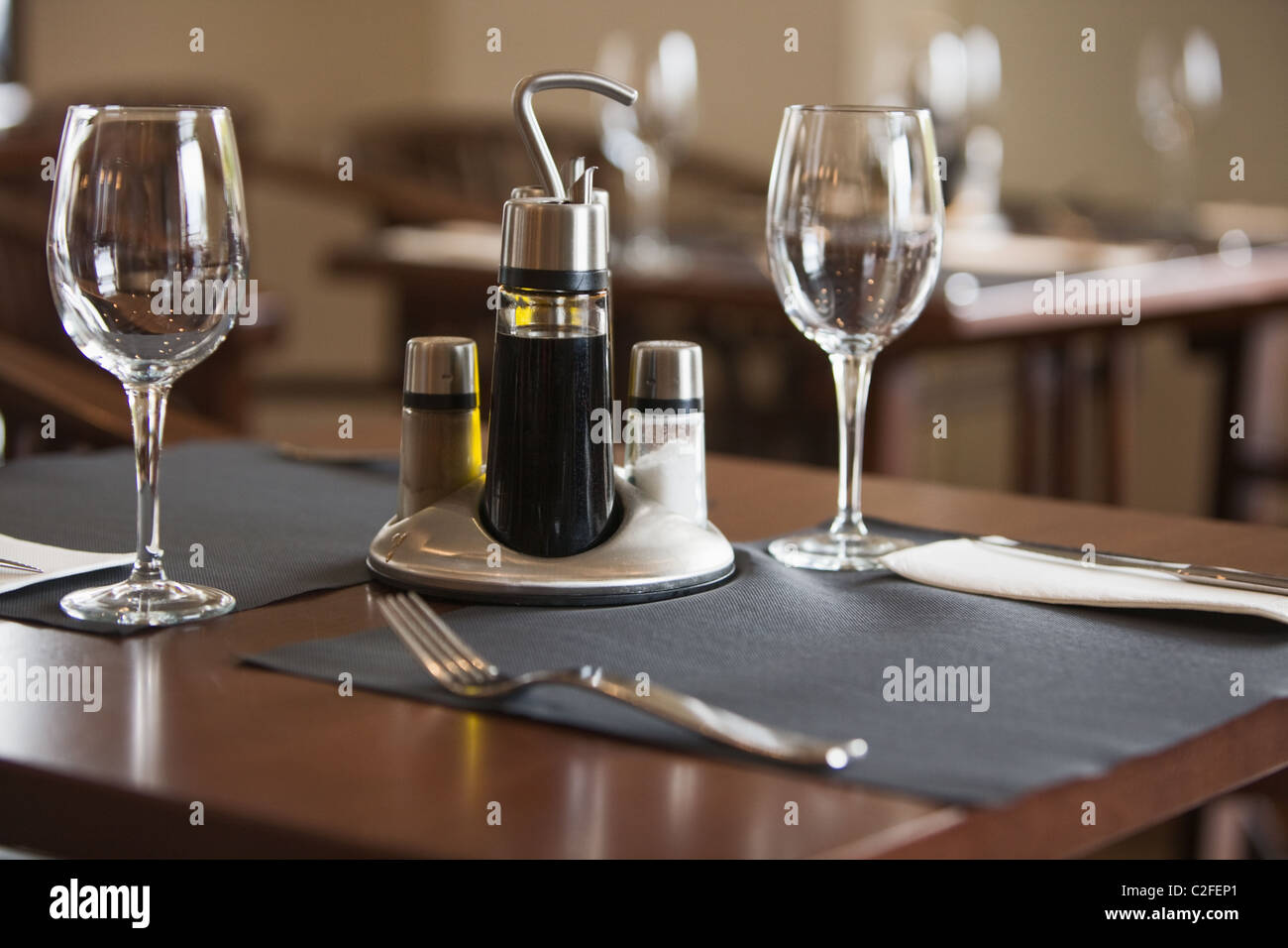 Restaurant dining table, set and ready Stock Photo - Alamy