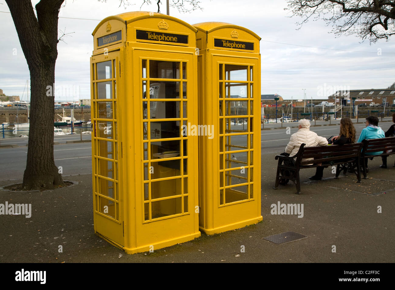 Yellow phone boxes Guernsey, Channel islands Stock Photo - Alamy